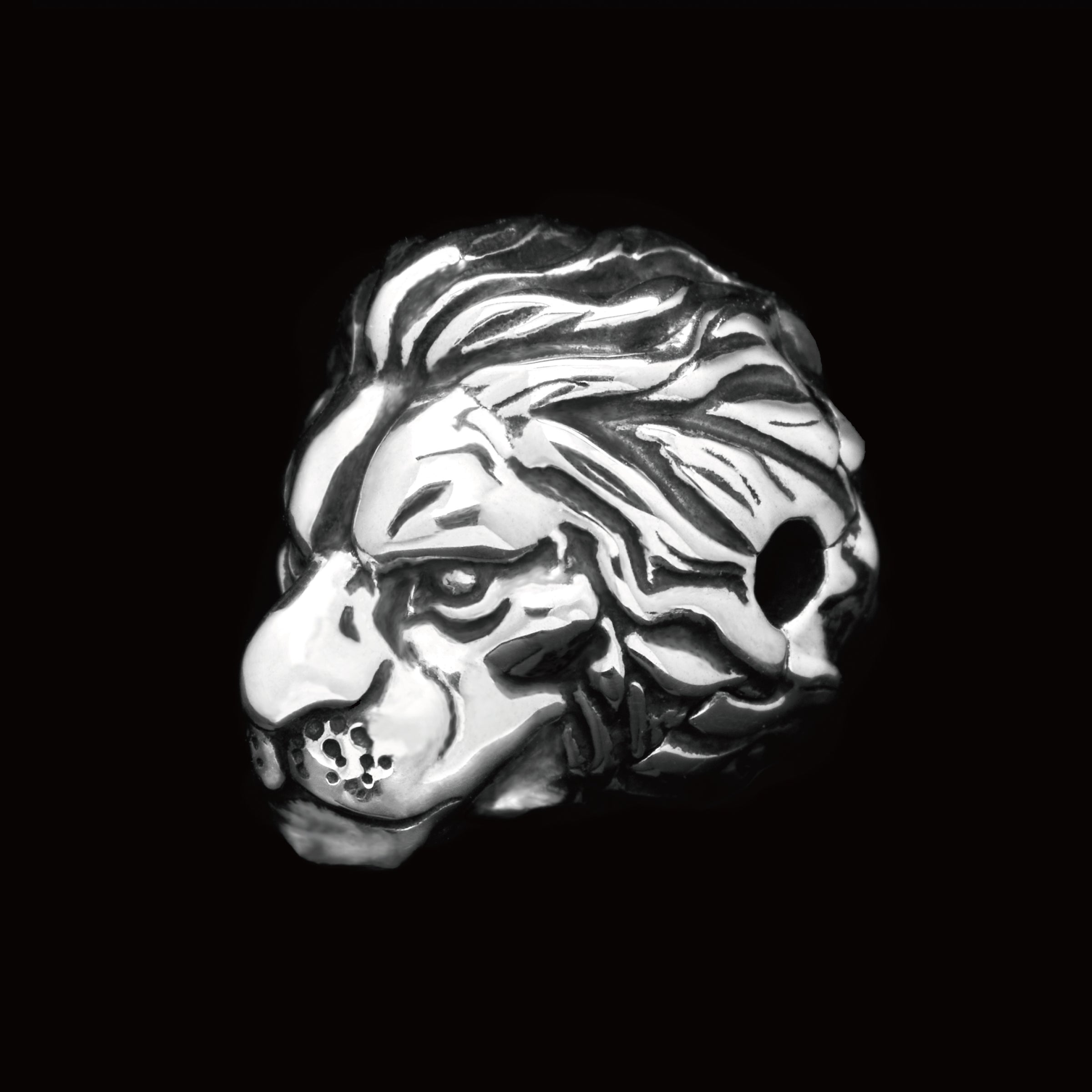 The king of the jungle. The lion head charm is made to impress. This ...